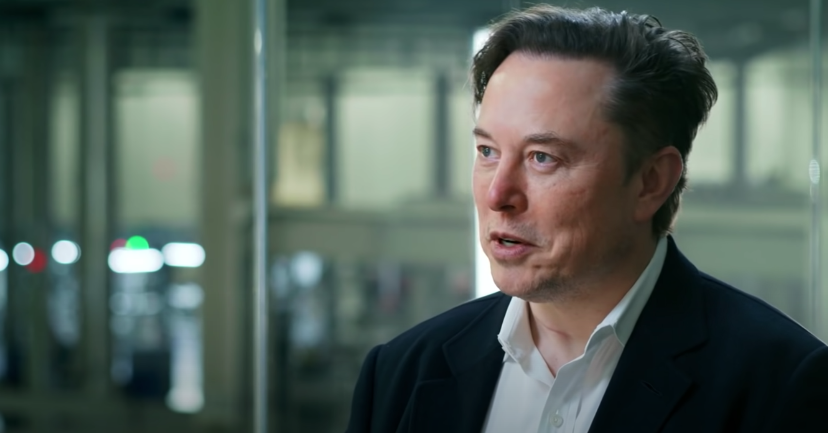 Bizarre Photo Of ‘Elon Musk Kissing A Robot’ Leaves Internet Confused